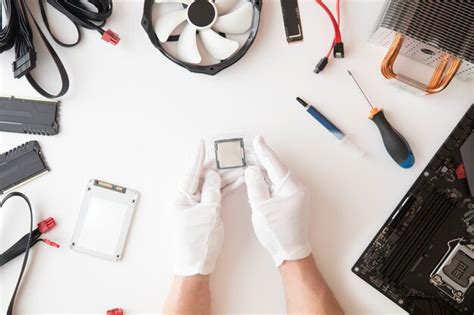 Premium Photo Top View Of Man Hands Holding Cpu Computer Parts And Accessories Electronics
