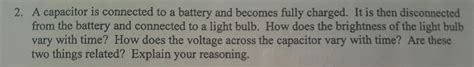 Solved A Capacitor Is Connected To A Battery And Becomes Chegg Com