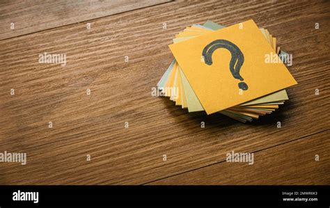 Questions And Answers Concept A Stack Of Paper With A Paper On Top