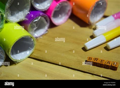 Break On Wooden Cubes With Colorful Paper And Pen Concept Inspiration On Wooden Background