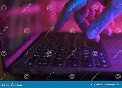 Person Typing At Laptop Computer At Night Female Uses Keyboard Shakes