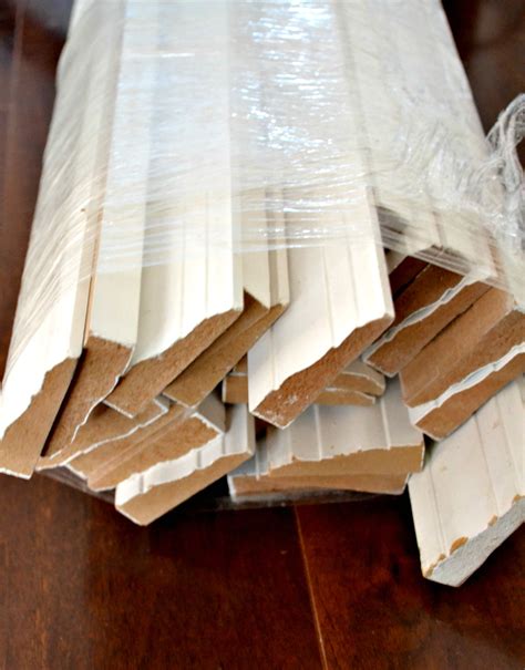 Adding Trim To The Living Room Windows Ugly Duckling House