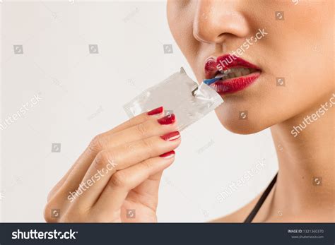 Woman Holding Condom Condom Shown By Stock Photo Edit Now