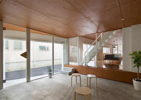 Naf Architect And Designs Roadside House Curves Around Driveway