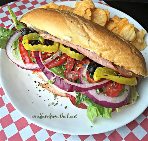 Toasted Hoagie Rolls Filled With Ham Salami Pepperoni And Melted
