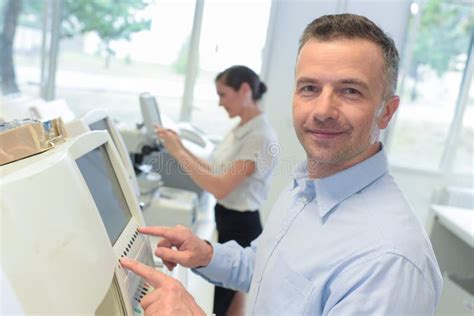 Man Testing Circuit Board In Lab Stock Image Image Of Repairing Selectivefocus