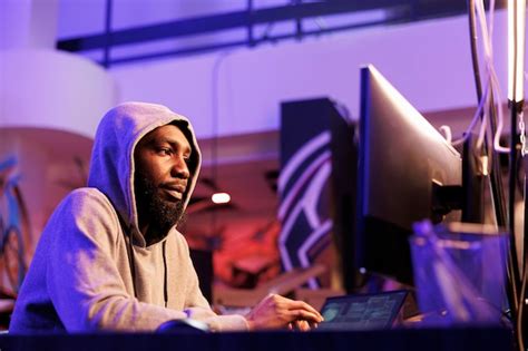 Premium Photo African American Criminal Hacking Online Server And Stealing Information Hacker