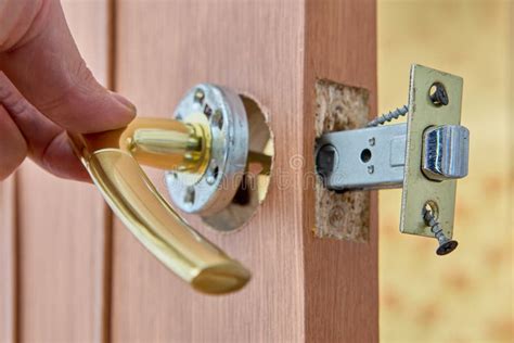 Door Handle With Latch At Time Of Installation On Internal Wooden Door Stock Image Image Of