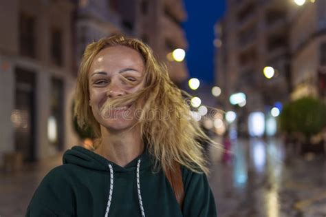 Beautiful Girl Smiles In The Evening The Girl Has Blond Hair The Girl