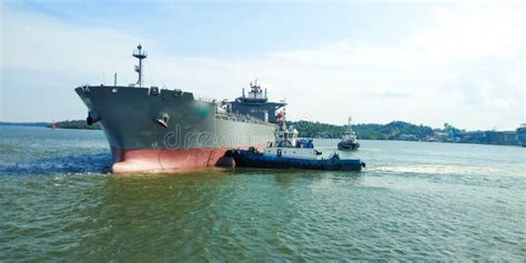 Harbors Tugs Support The Oil Tanker For Berthing Process In The Port Areas Stock Image Image