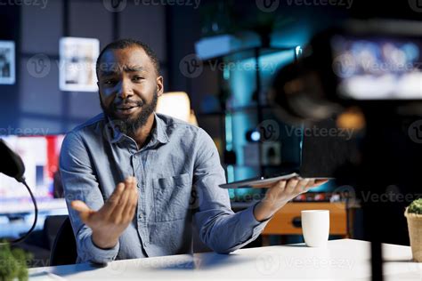African American Content Creator Filming Tech Tutorial On How To Repair