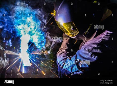 Sailor Welds L Brackets Together Aboard USS Ronald Reagan Stock Photo Alamy
