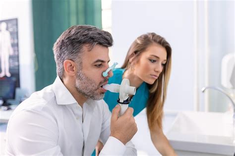 Premium Photo Adult Man Testing Breathing Function By Spirometry Having Health Problem