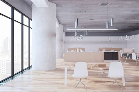 도시 전망과 일광 3d 렌더링을 갖춘 파티션 장비 가구 창을 갖춘 밝은 콘크리트 및 목재 공동 작업실 내부 프리미엄 사진