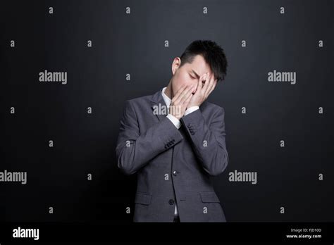 Tired Chinese Businessman Stock Photo Alamy
