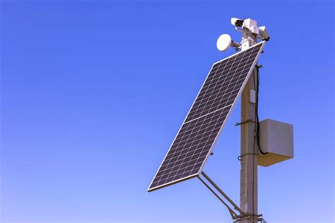 Premium Photo Solar Panel With Cctv Cameraon Pillar On Sky Background