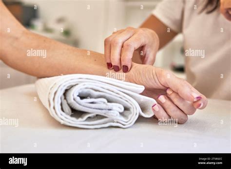 Doctor Making Pulse Diagnosis Test For Cardiovascular Health Checking