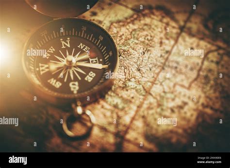 Closeup Of Compass And Paper Map Old Navigation Tools Vintage Style