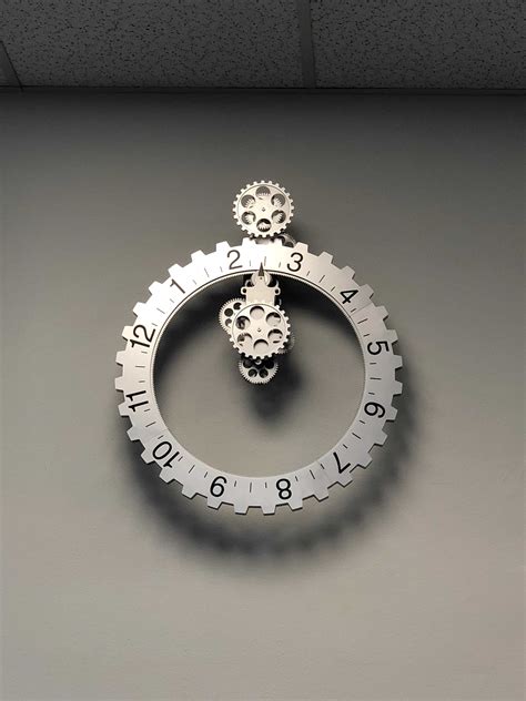The Numbers On This Clock Rotate While The Hand Stays Still