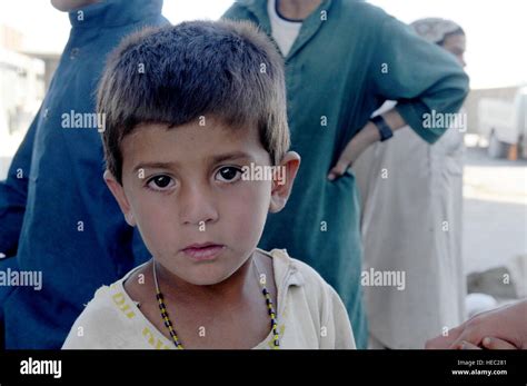 An Afghan boy poses for a photograph in Sharana, Afghanistan, Oct. 1 ...