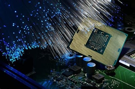Modern Pc Processor On A Motherboard Illuminated By A Fiber Optic Lamp