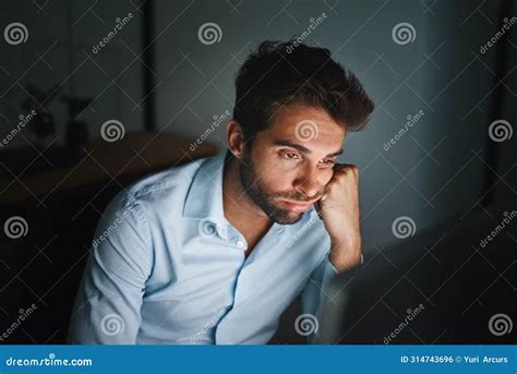 Man Tired And Bored In Office With Computer For Coding Programming