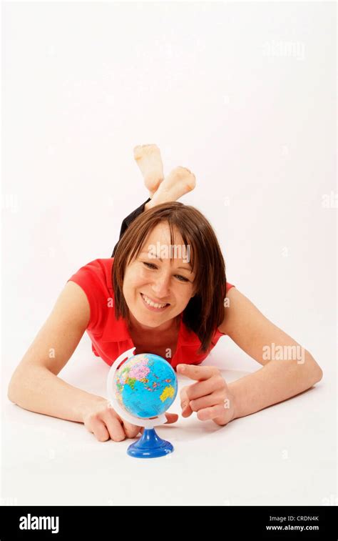 Woman With Globe Stock Photo Alamy