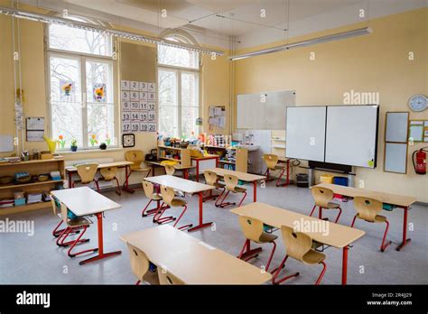 Interior Of Neat Classroom With Racks And Furniture At Babe Stock Photo Alamy