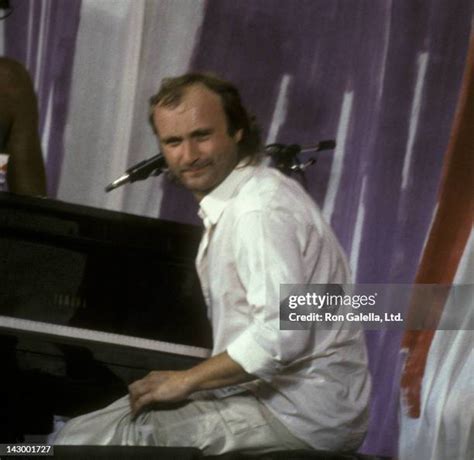 Phil Collins Live Aid Photos And Premium High Res Pictures Getty Images