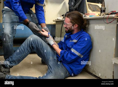 Engineer Worker With Accident At Factory During Working Stock Photo Alamy