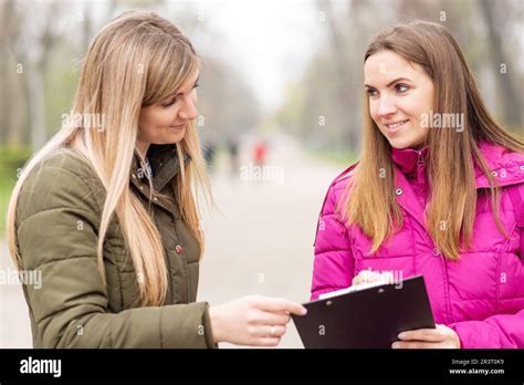 Opinion Poll A Woman Interviewing People Conducting Survey Standing