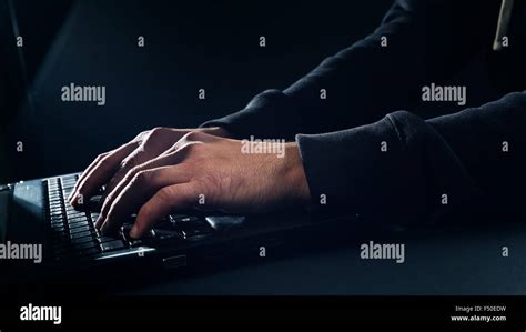 Hacker Man Typing On Laptop Computer Keyboard Stock Photo Alamy