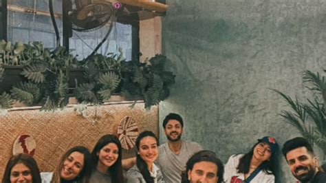 Newlyweds Surbhi Jyoti And Sumit Suri Catch Up With Friends Karan Wahi
