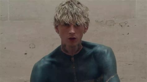 Machine Gun Kelly Reveals Why He Covered Body In Blacked Out Tattoo