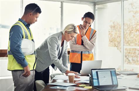 Premium Photo Engineering Teamwork And Planning With Blueprint In Office For Construction