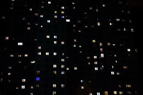 premium photo facade of large multistorey block of flats with many