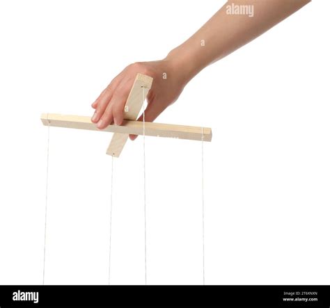 Woman Pulling Strings Of Puppet On White Background Closeup Stock Photo Alamy