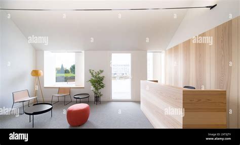 This Image Showcases The Interior Of A Modern Dental Clinic Highlighted By Natural Light A