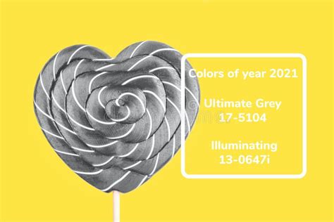 Gray Lollipop In The Shape Of A Heart On A Yellow Background Editorial