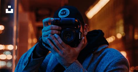 Dslr 카메라를 사용하여 사진을 찍는 남자 사진 Unsplash의 무료 사진기 이미지