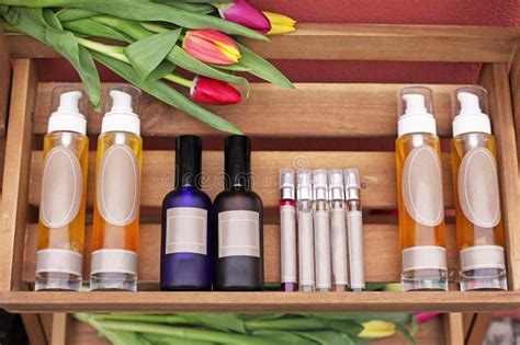 Unbranded Bottles Of Organic Cosmetic Products On Wooden Display Stock