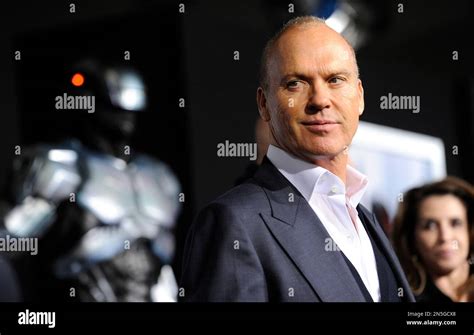 Michael Keaton A Cast Member In Robocop Poses At The Premiere Of