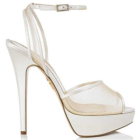 Thandiwe Newton Clashes In Charlotte Olympia Pomeline Sandals