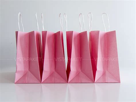 Паперові бурі крафт пакети з ручками — Готові крафтові пакети купити у Києві ціна фотографії