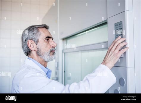 Scientist In Lab Handling Security System Stock Photo Alamy