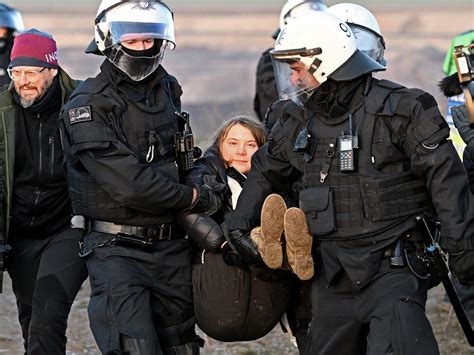 Video Shows Greta Thunberg Smiling As German Police Carry Her Away From