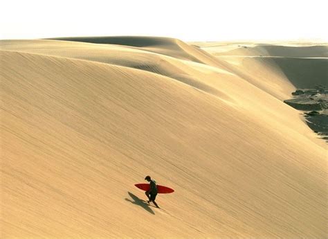 Surfer Shayne Mcintire In Oman Dune Walking Surfing Photography