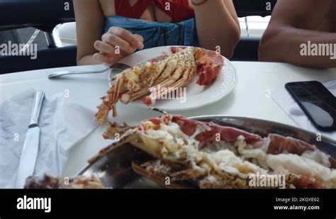 Just Cooked A Fresh Lobster People Eat Lobster On The Boat Rocking