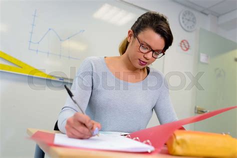 Class Teacher Preparing Her Lessons Stock Image Colourbox