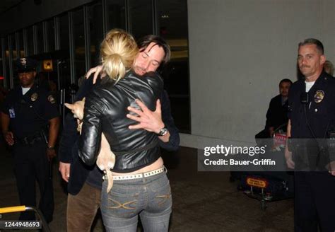 Keanu Reeves Amanda De Cadenet Photos And Premium High Res Pictures
